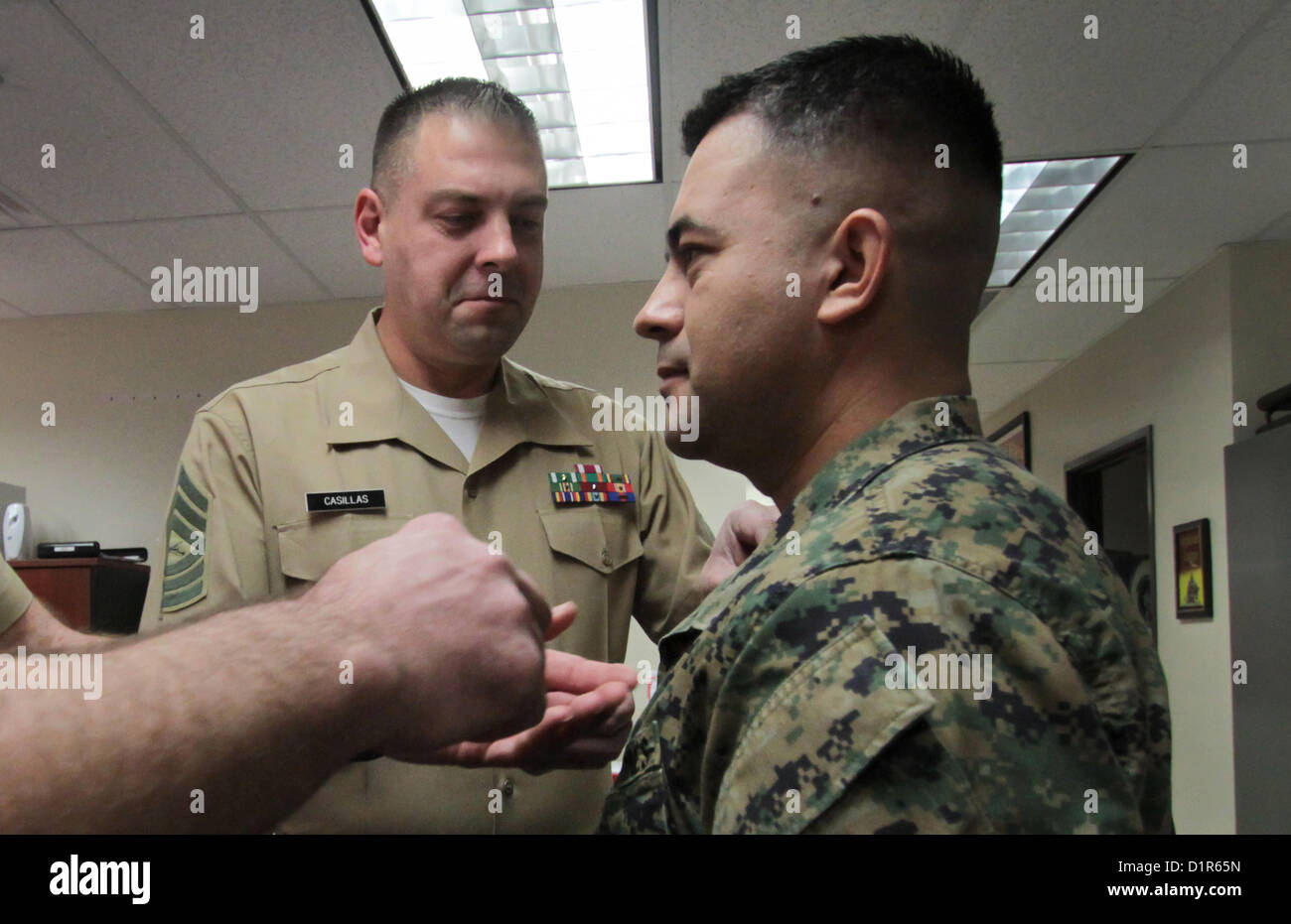 Gunnery Sgt. Roque Palmerinvega is promoted to gunnery sergeant during a ceremony at the Marine ...
