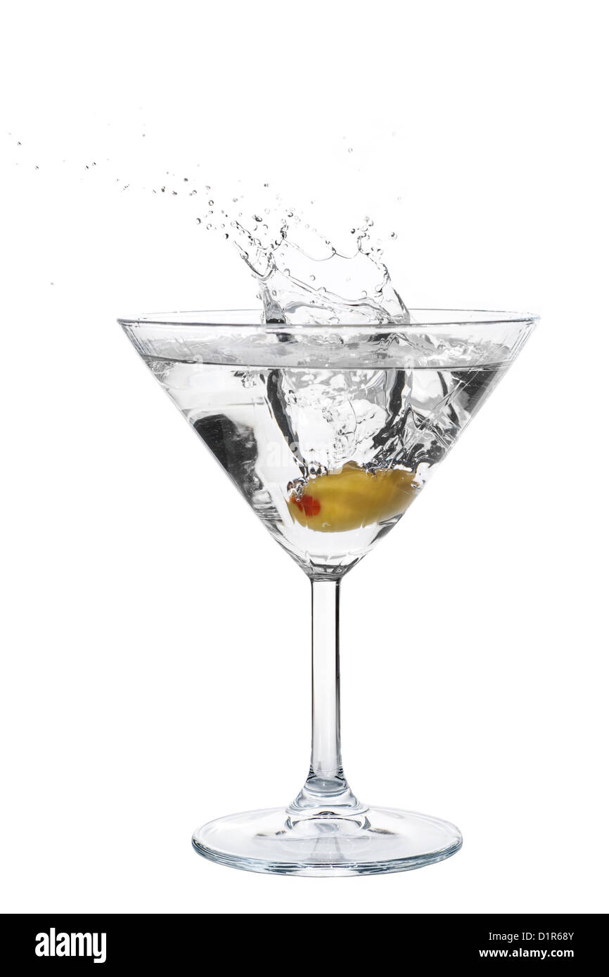 Cocktail splash with an olive on isolated background Stock Photo - Alamy