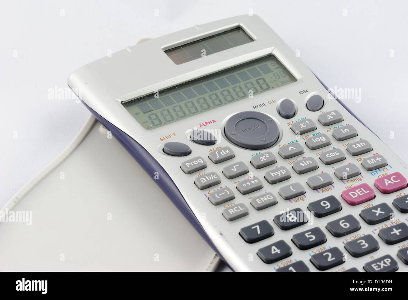 Isolated calculator on white background Stock Photo - Alamy