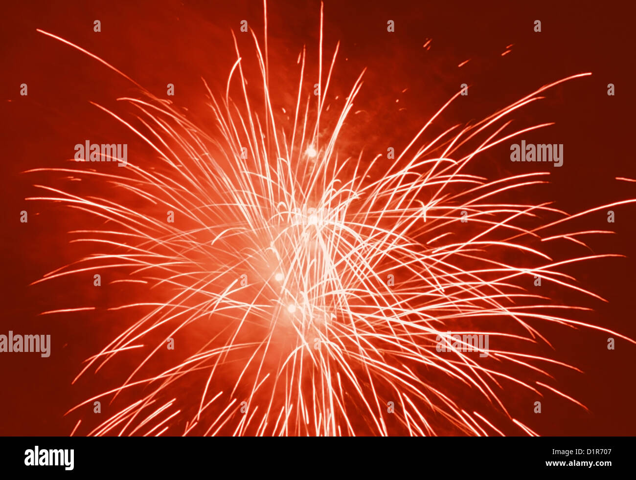 red abstract holiday fireworks background Stock Photo - Alamy