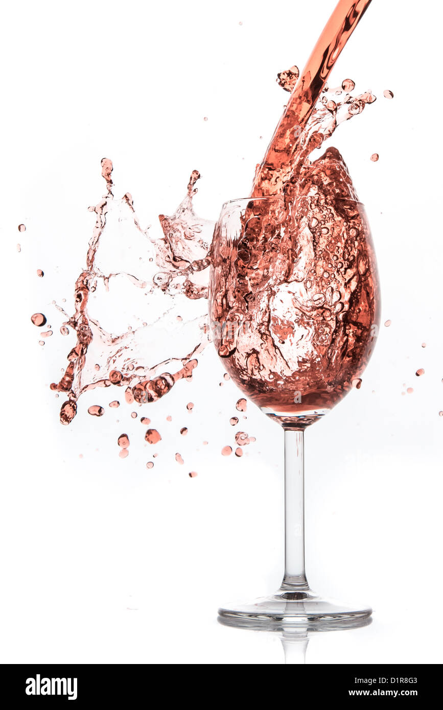 rose wine splashing on white background Stock Photo - Alamy