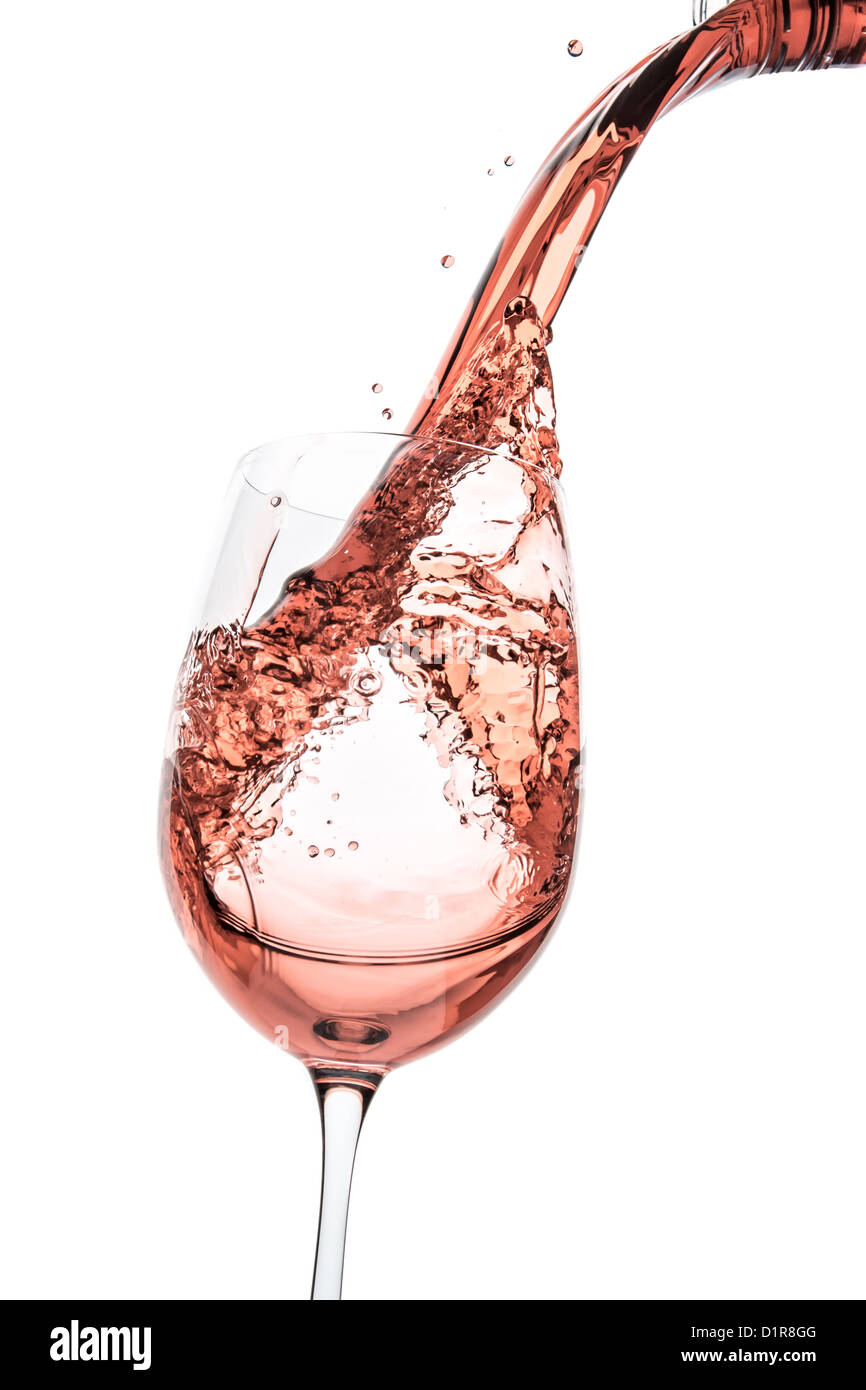 rose wine splashing on white background Stock Photo - Alamy