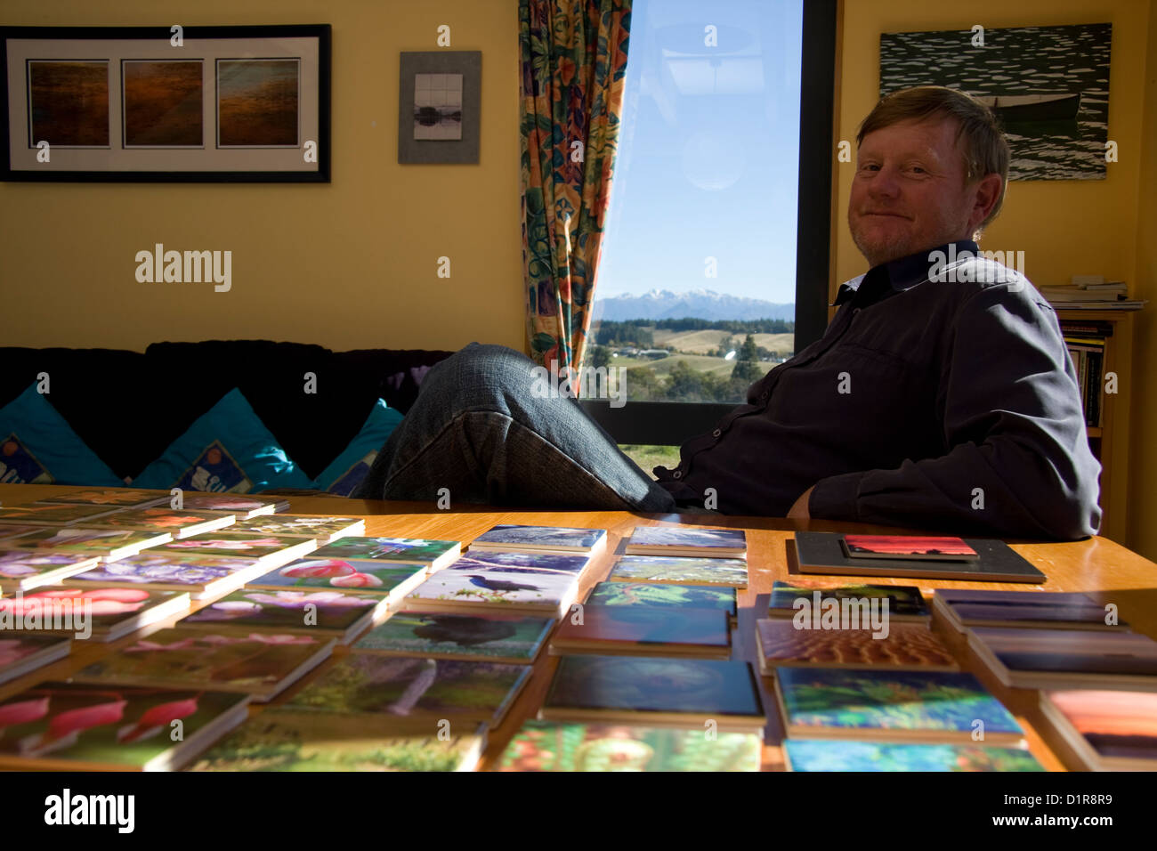 Basil Steele, a photoartist resident in Nelson, with his prints on tile ...