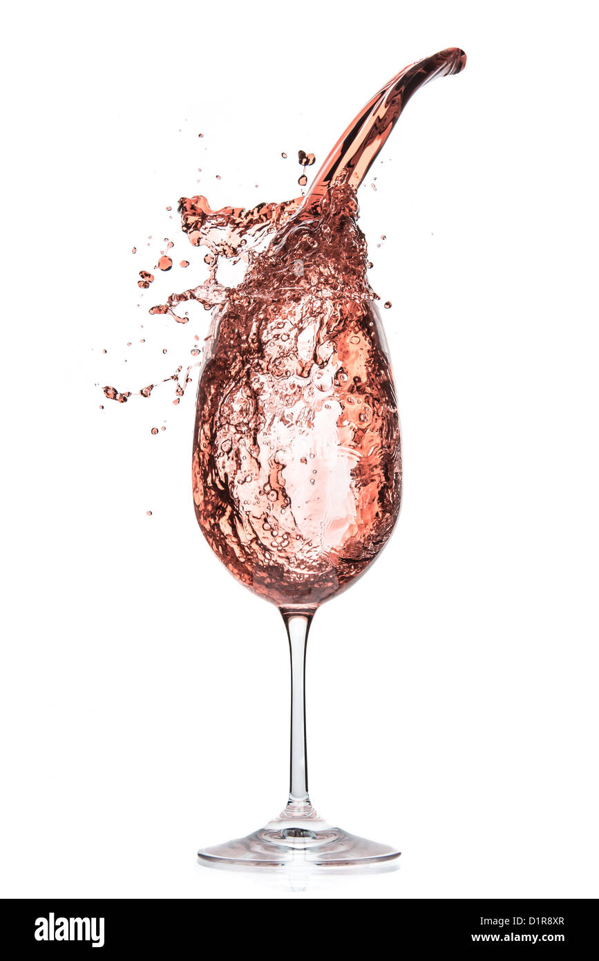 rose wine splashing on white background Stock Photo - Alamy