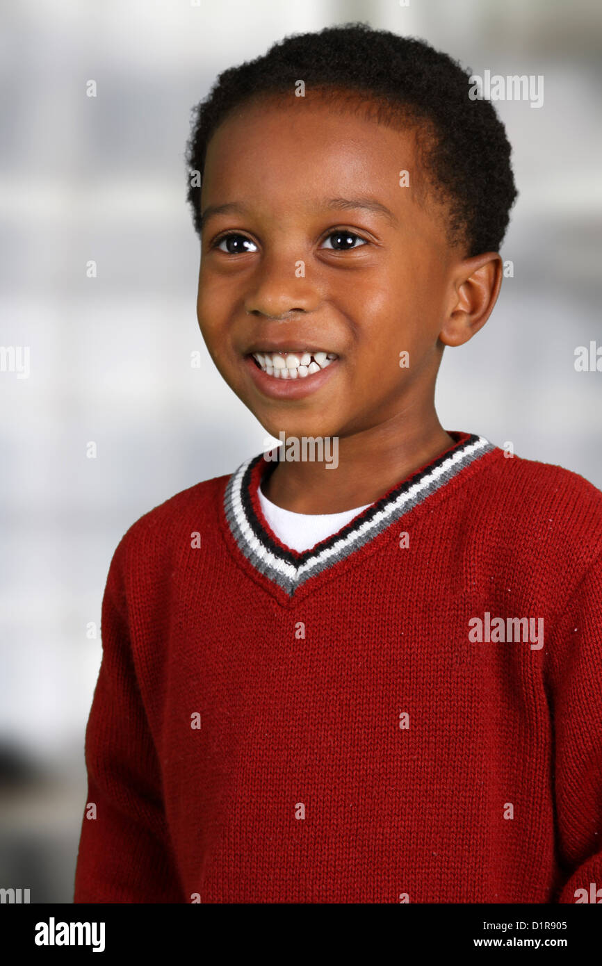 Portrait of a boy who is inside his home Stock Photo - Alamy