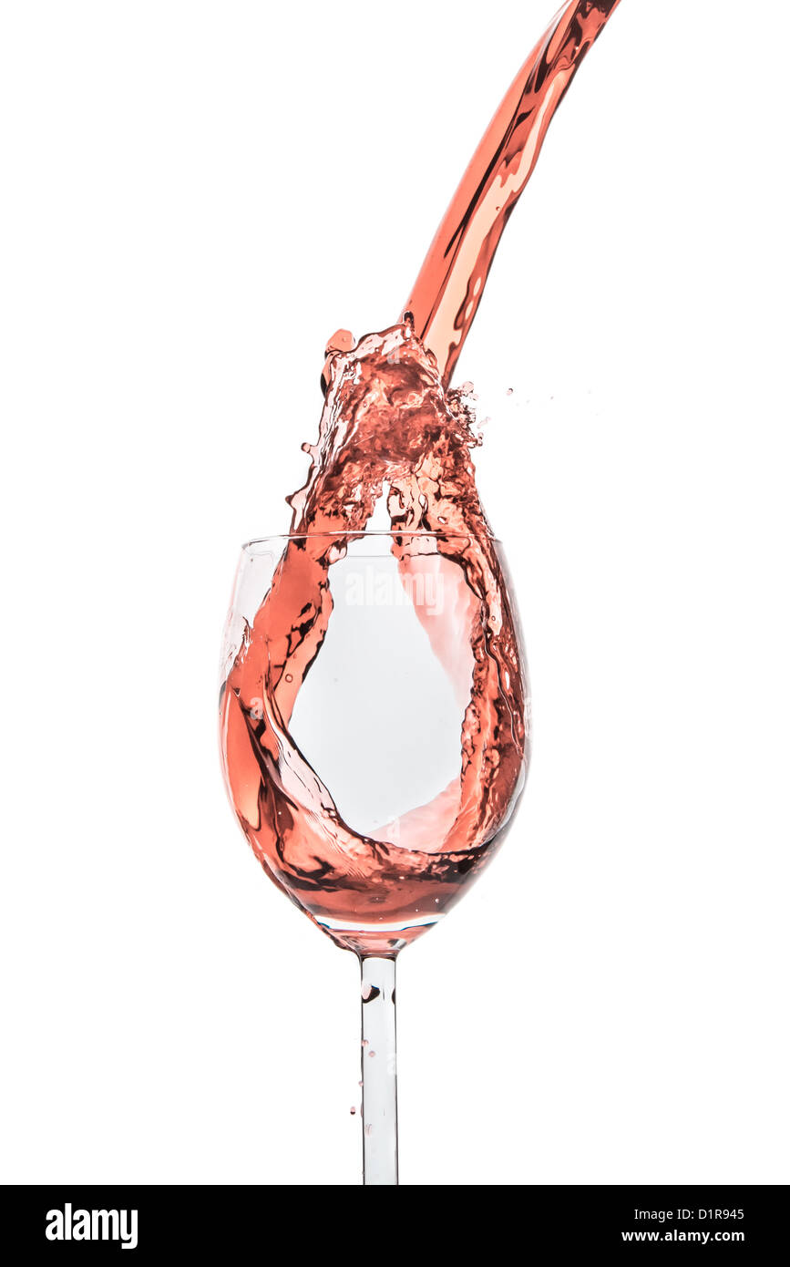 rose wine splashing on white background Stock Photo - Alamy