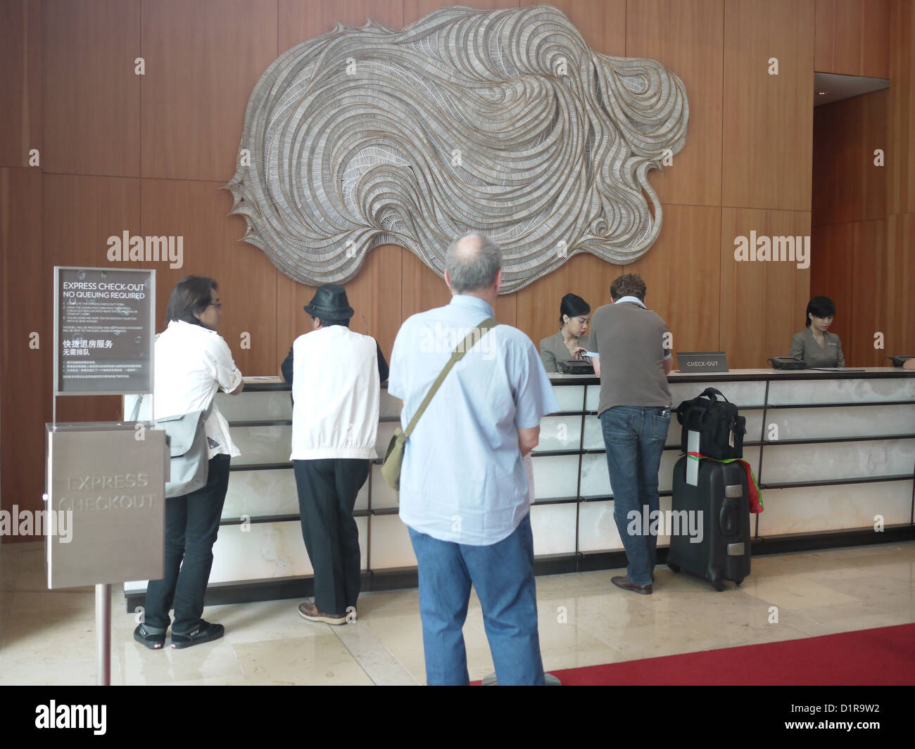 hotel check in counter Stock Photo - Alamy