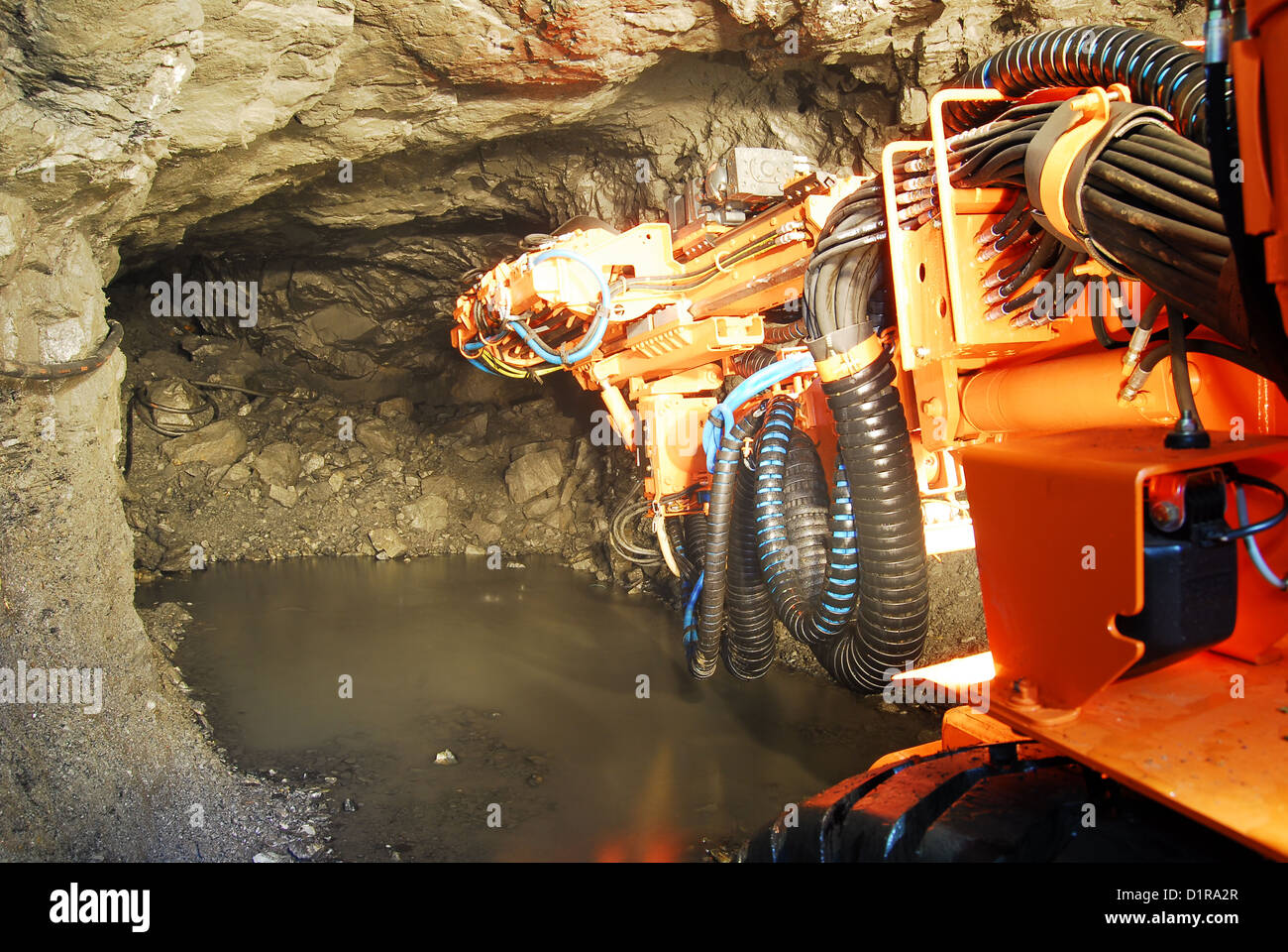 New heavy duty machine inside a mine shaft Stock Photo - Alamy