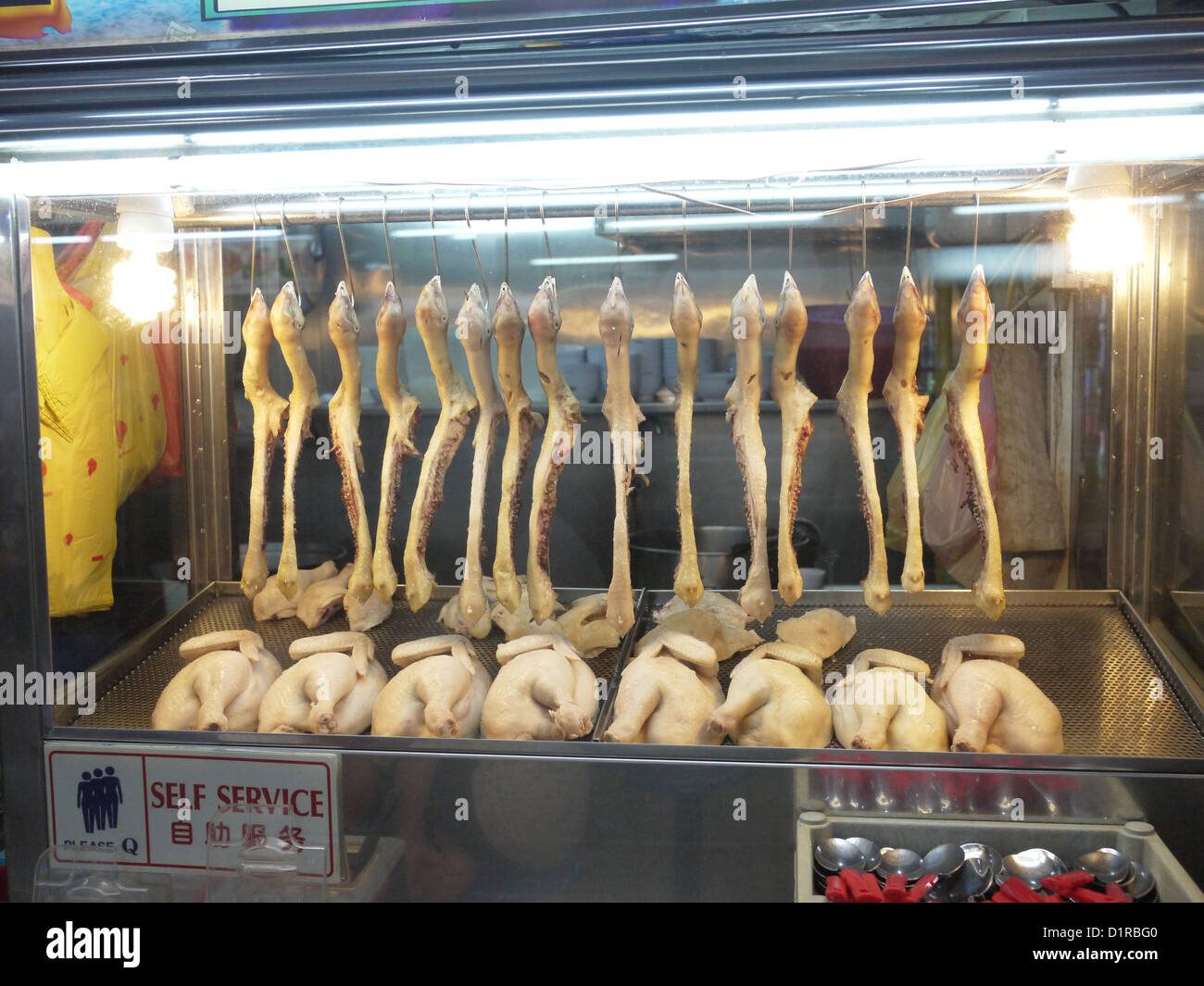 Neck hanging chicken hi-res stock photography and images - Alamy