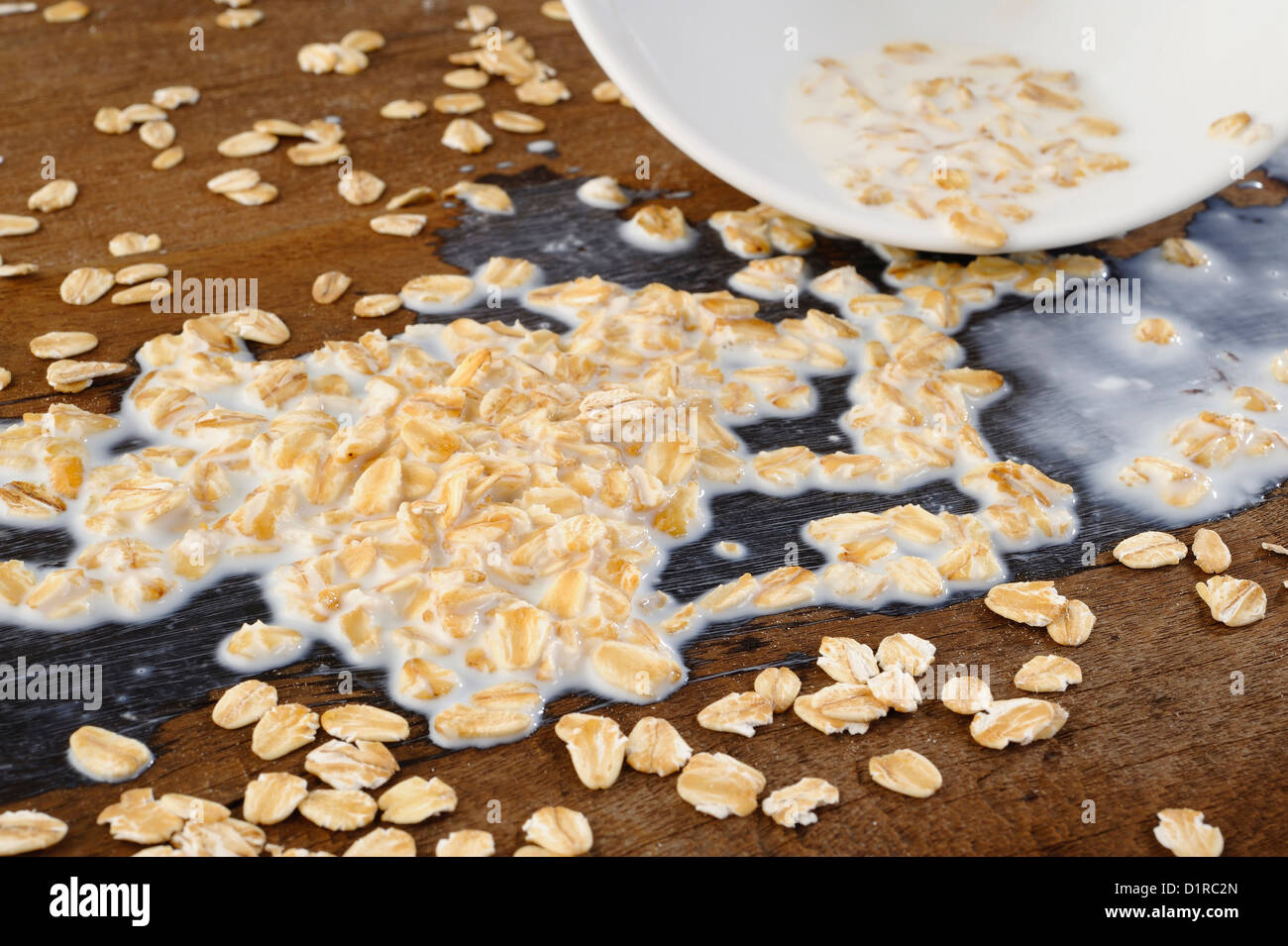 oats was damaged on wooden table Stock Photo - Alamy
