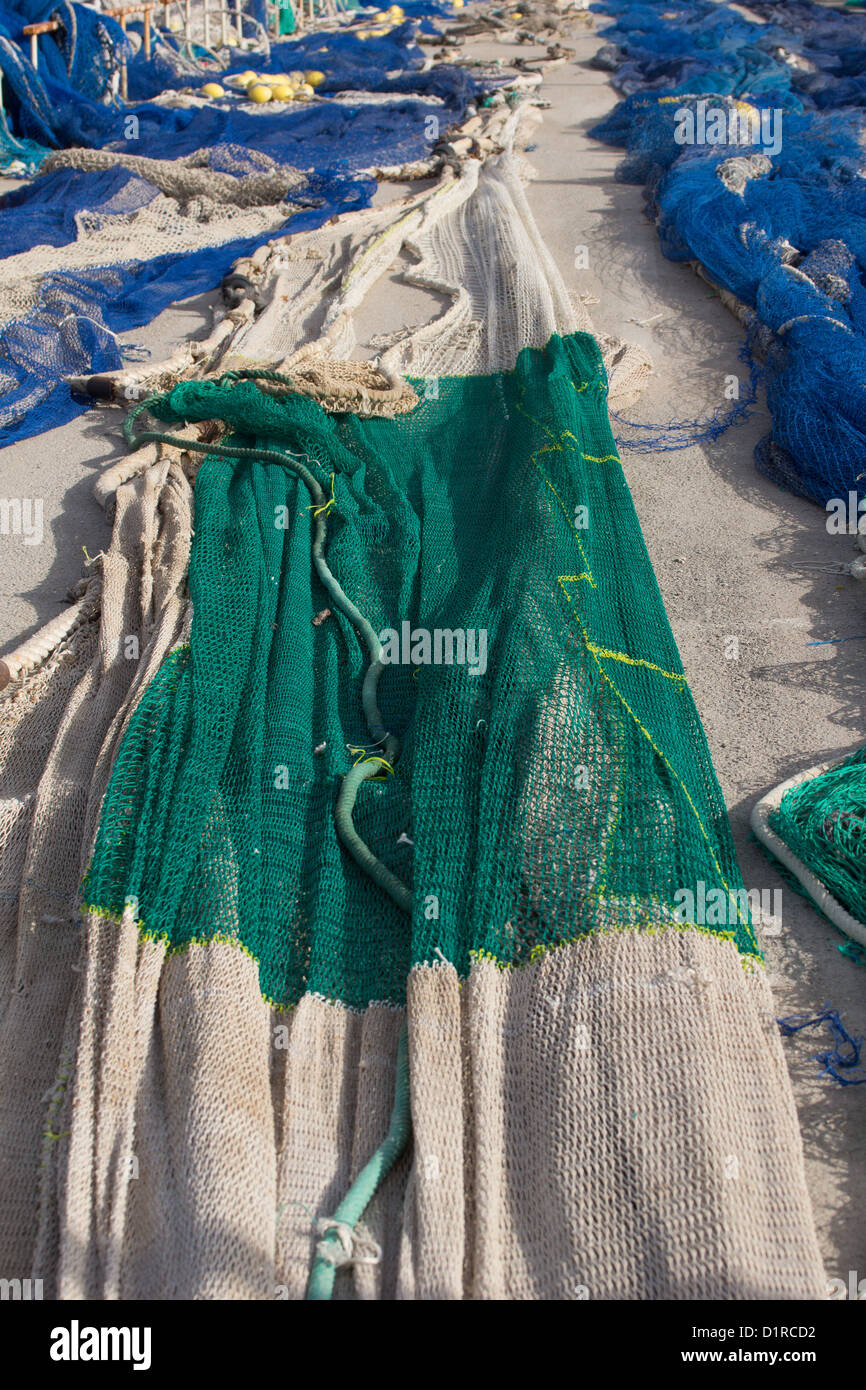 Fishingnets laid out to dry in the sun Stock Photo - Alamy