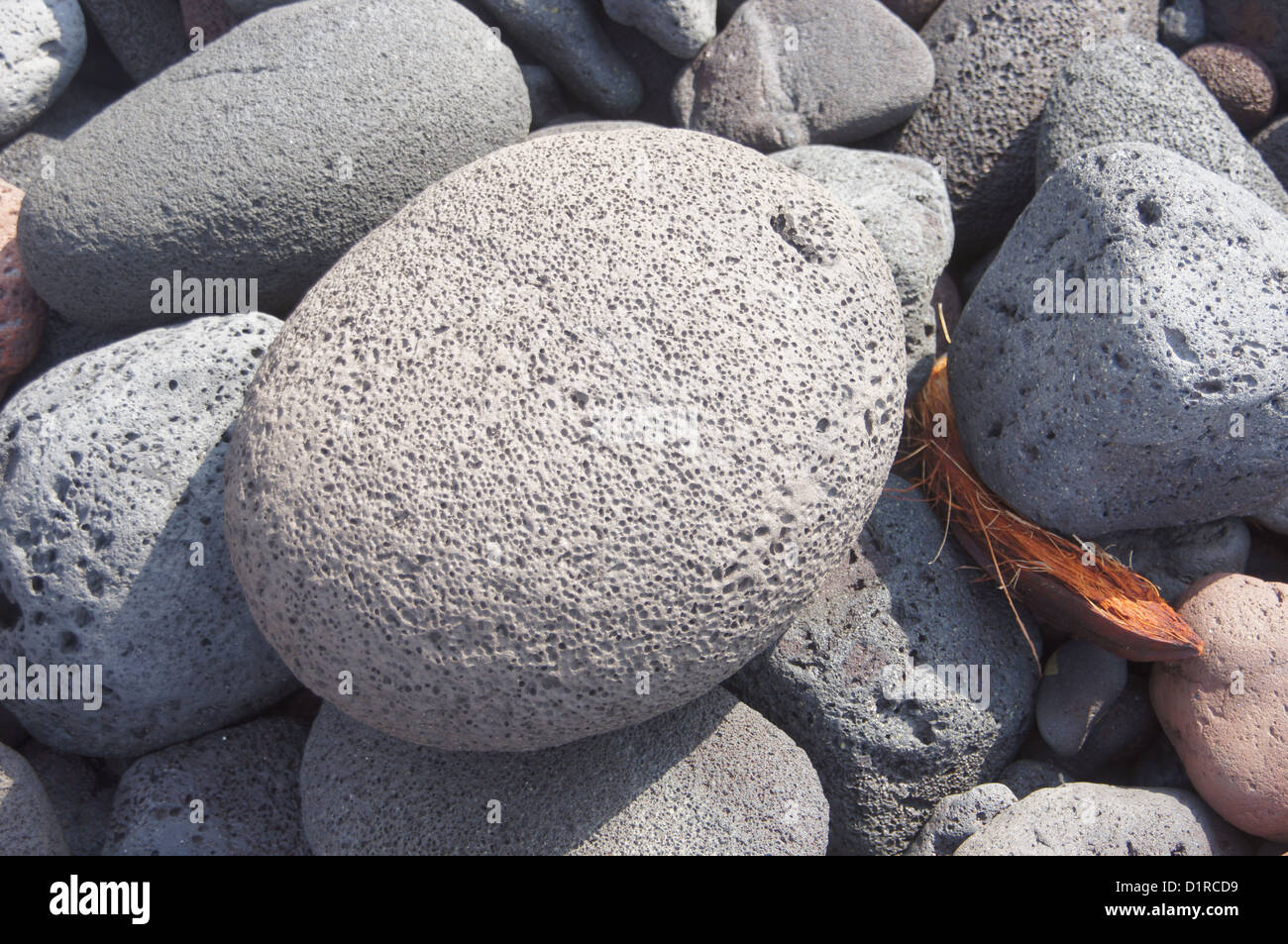 Lava rocks, rounded by the ocean at Napo'opo'o beach in Kealakekua Bay ...