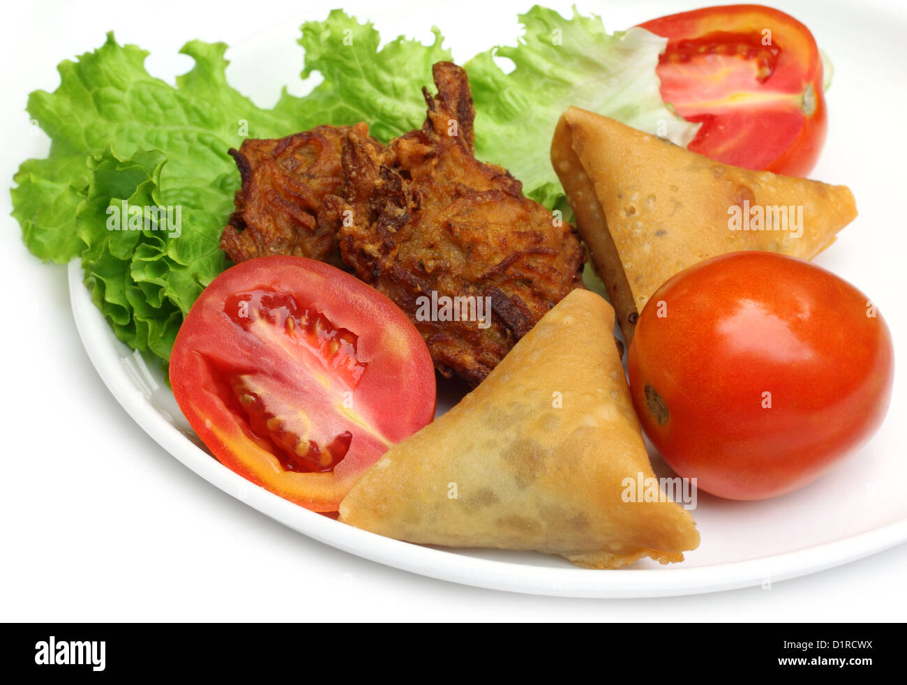 Samosa with mushroom snack with salad items of Indian subcontinent ...