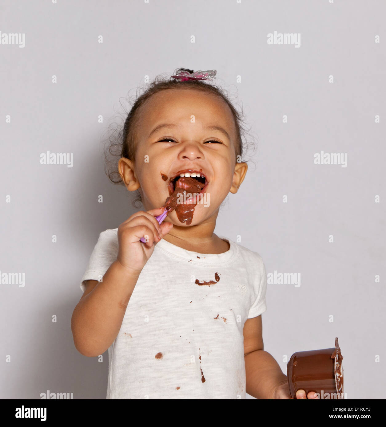 Cute Baby Girl With Chocolate