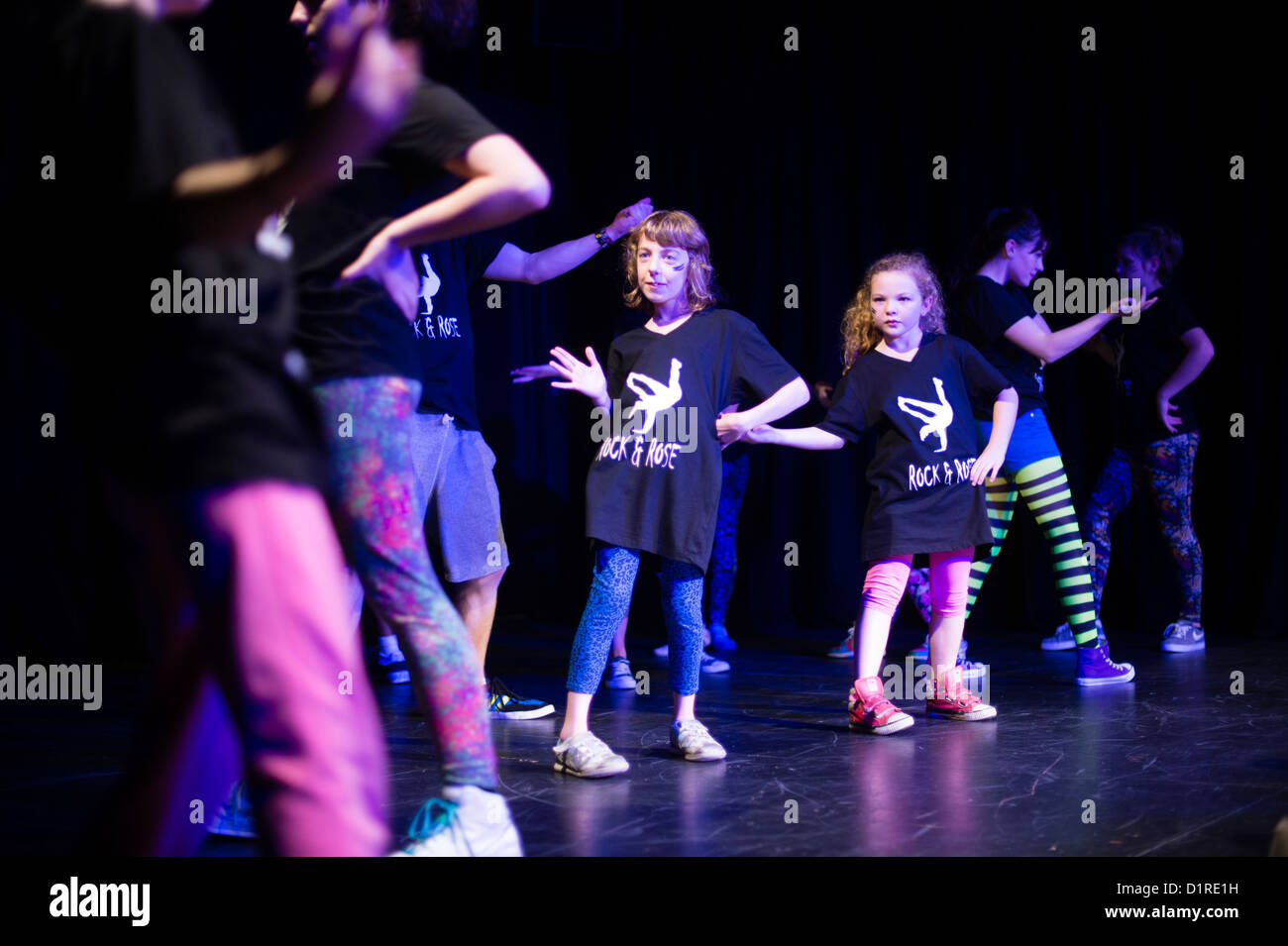A group of young girls taking part in a break dancing workshop, UK ...