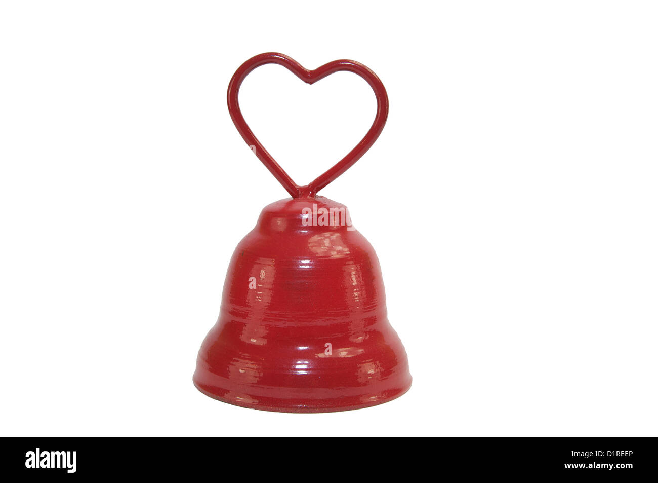 Red metal bell on a white background Stock Photo - Alamy