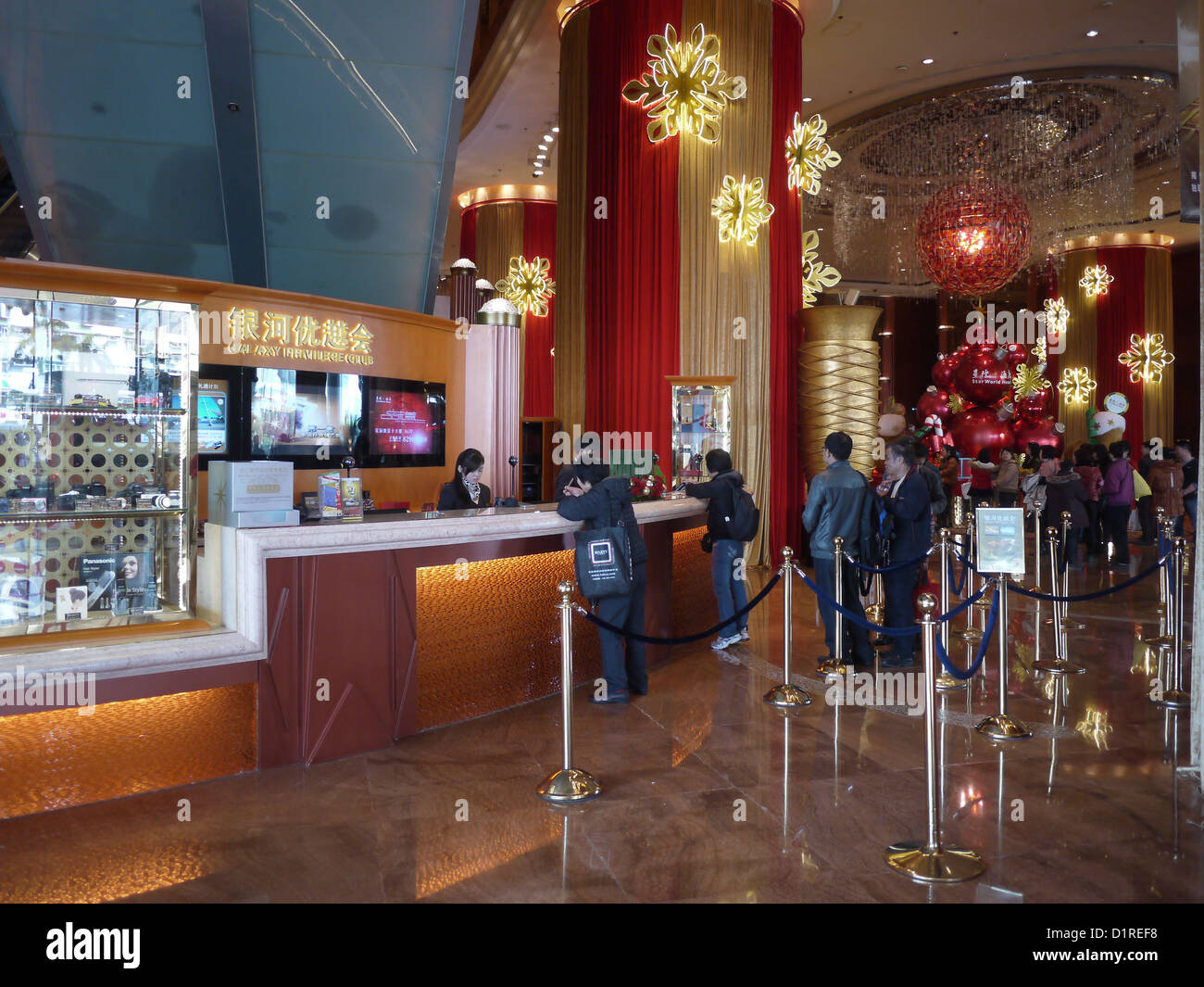 Galaxy Macau hotel lobby check in lineup Stock Photo - Alamy