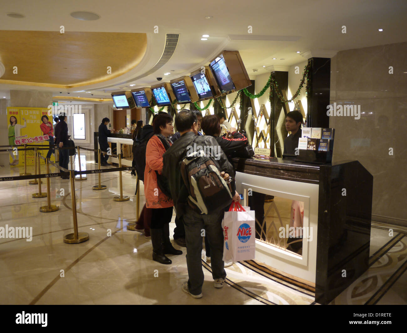 Asian hotel lobby checkin counter Stock Photo - Alamy