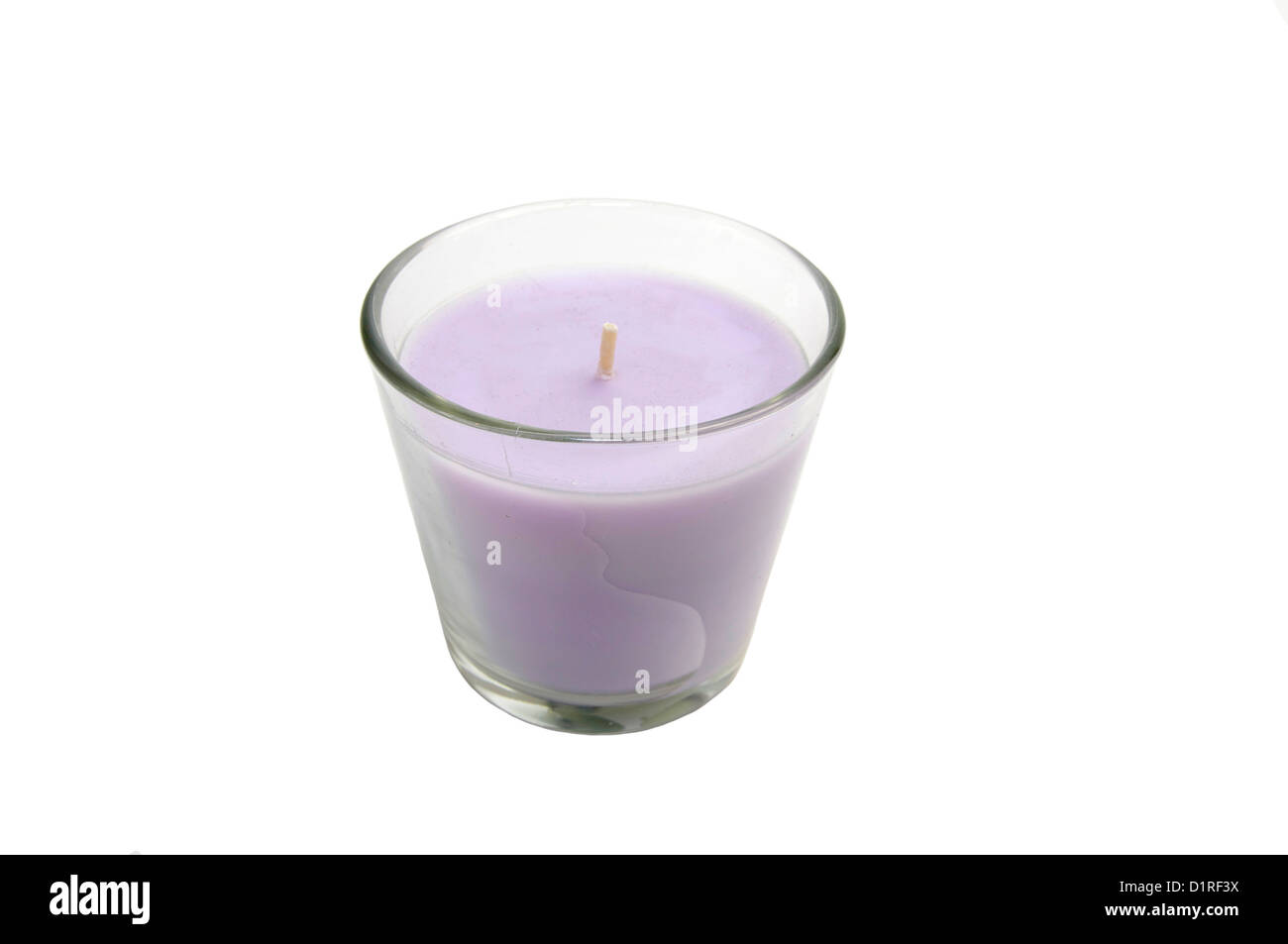 Candle in a glass beaker on a white background Stock Photo - Alamy