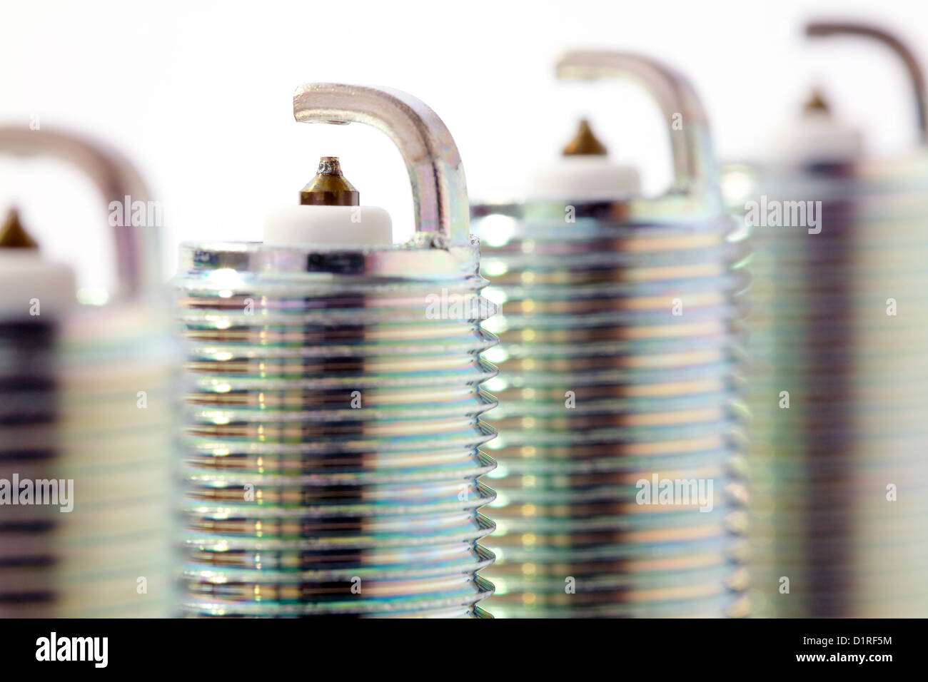 Close up of a spark plugs isolated on white background Stock Photo - Alamy