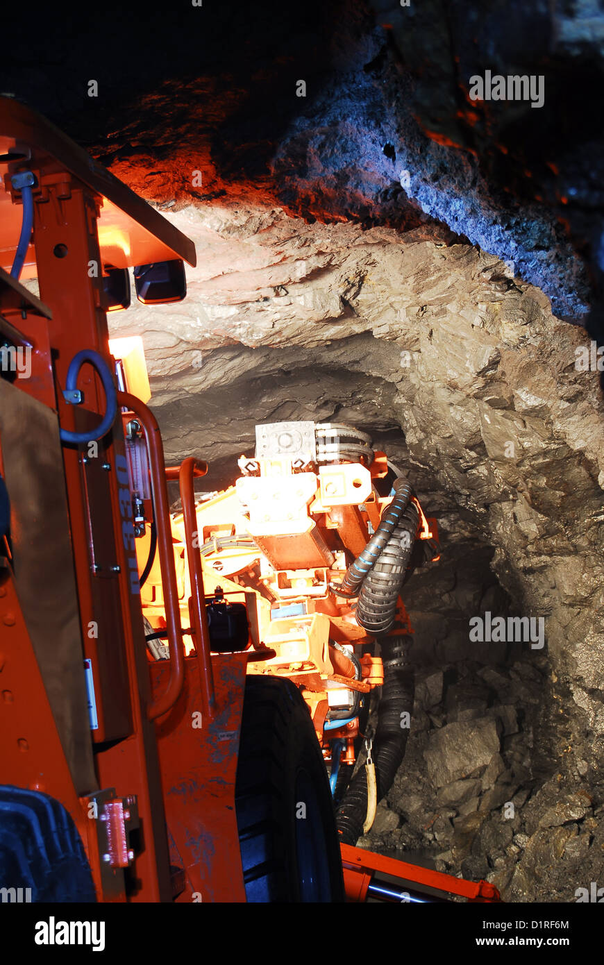 heavy duty mine machine working in the shaft Stock Photo - Alamy