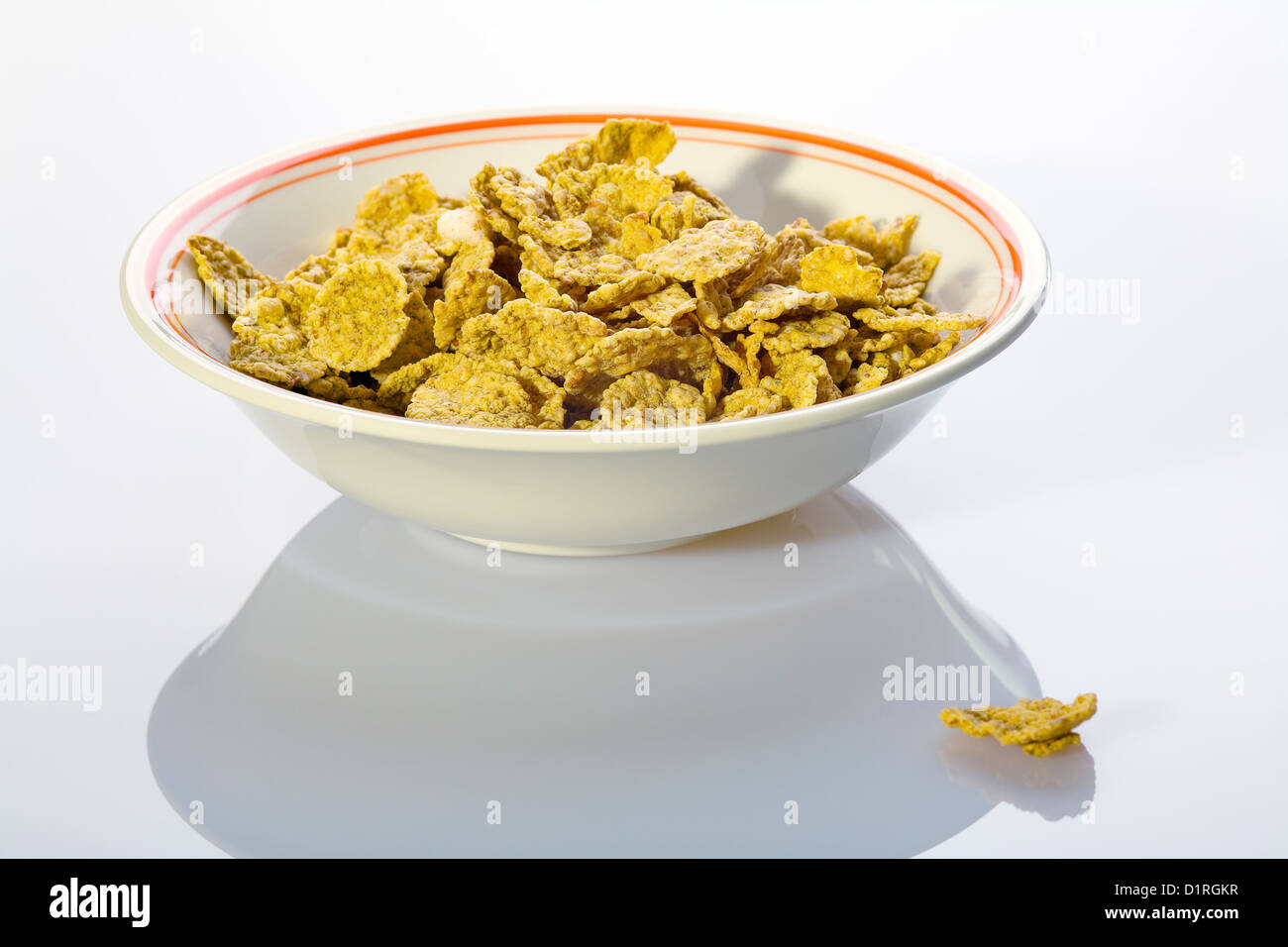 Close up of sweet cornflakes in a porcelain bowl Stock Photo - Alamy