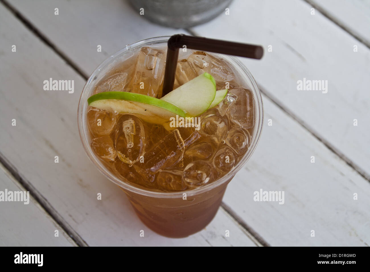 Apple tea with ice and apple pulp Stock Photo - Alamy