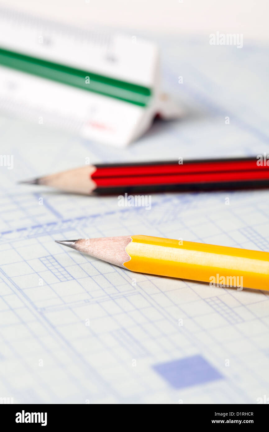 Pencils and scale on blueprint Stock Photo - Alamy