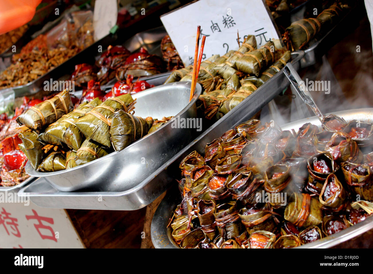 Local street food at a market during the Dragon Boat Festival in ...