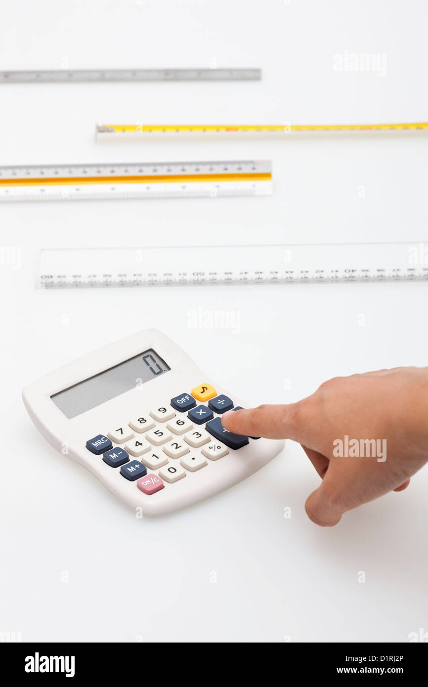 Rulers and calculator Stock Photo - Alamy
