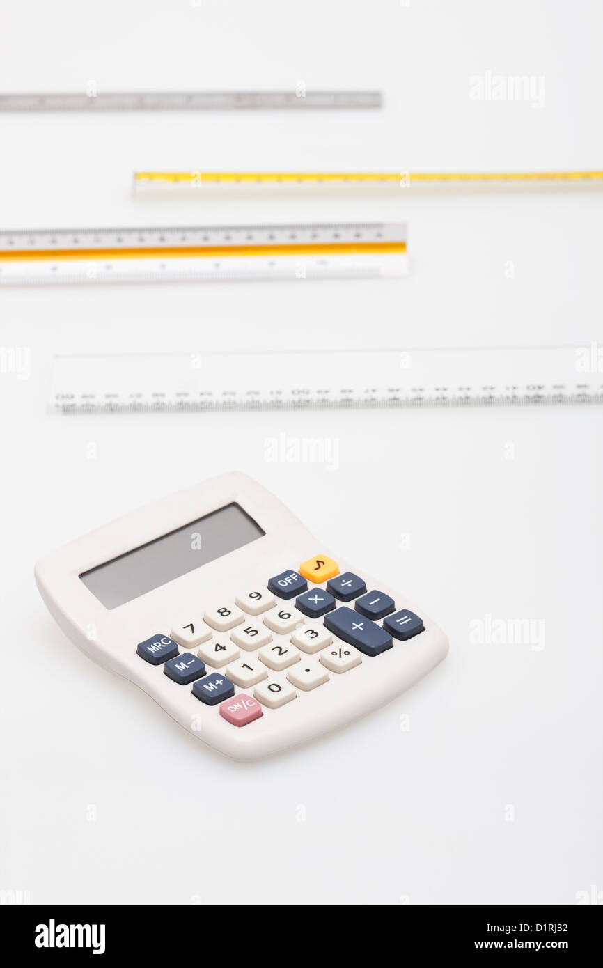 Rulers and calculator Stock Photo - Alamy