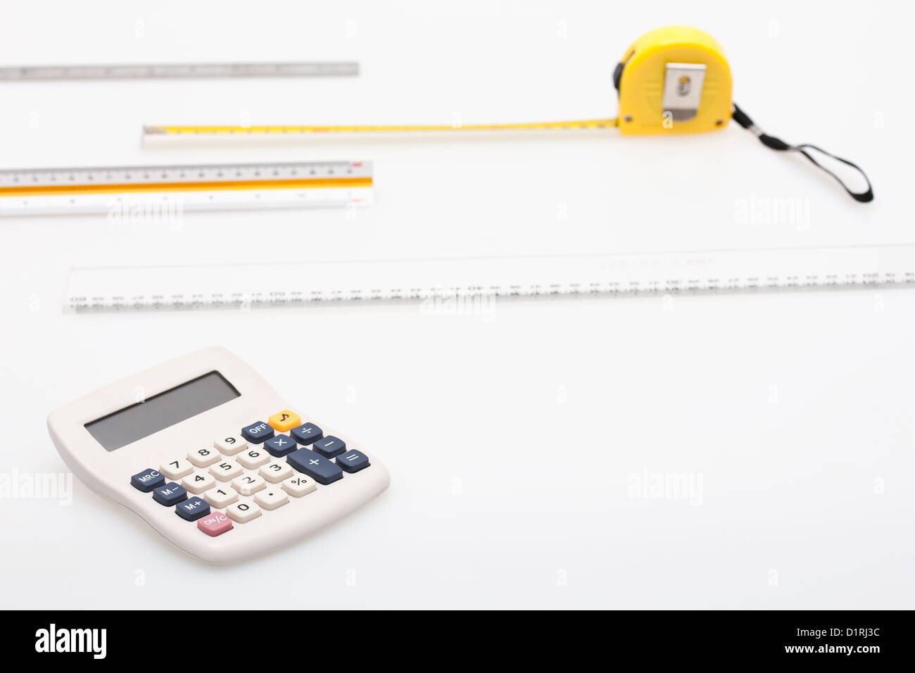 Rulers and calculator Stock Photo - Alamy