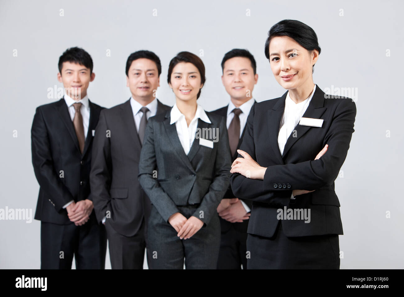 Portrait of professional and confident business team Stock Photo - Alamy