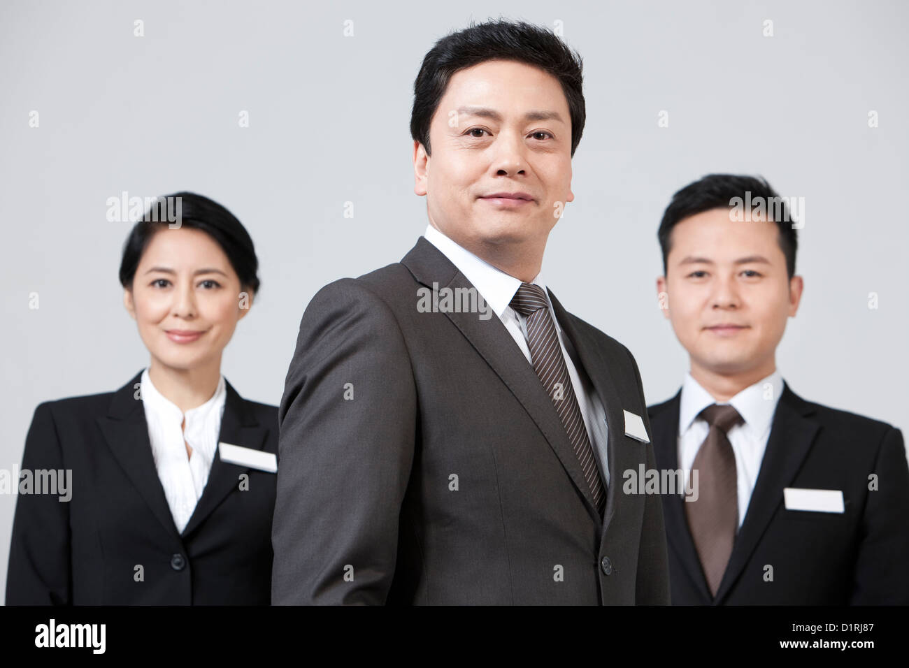 Portrait of ambitious business team Stock Photo - Alamy