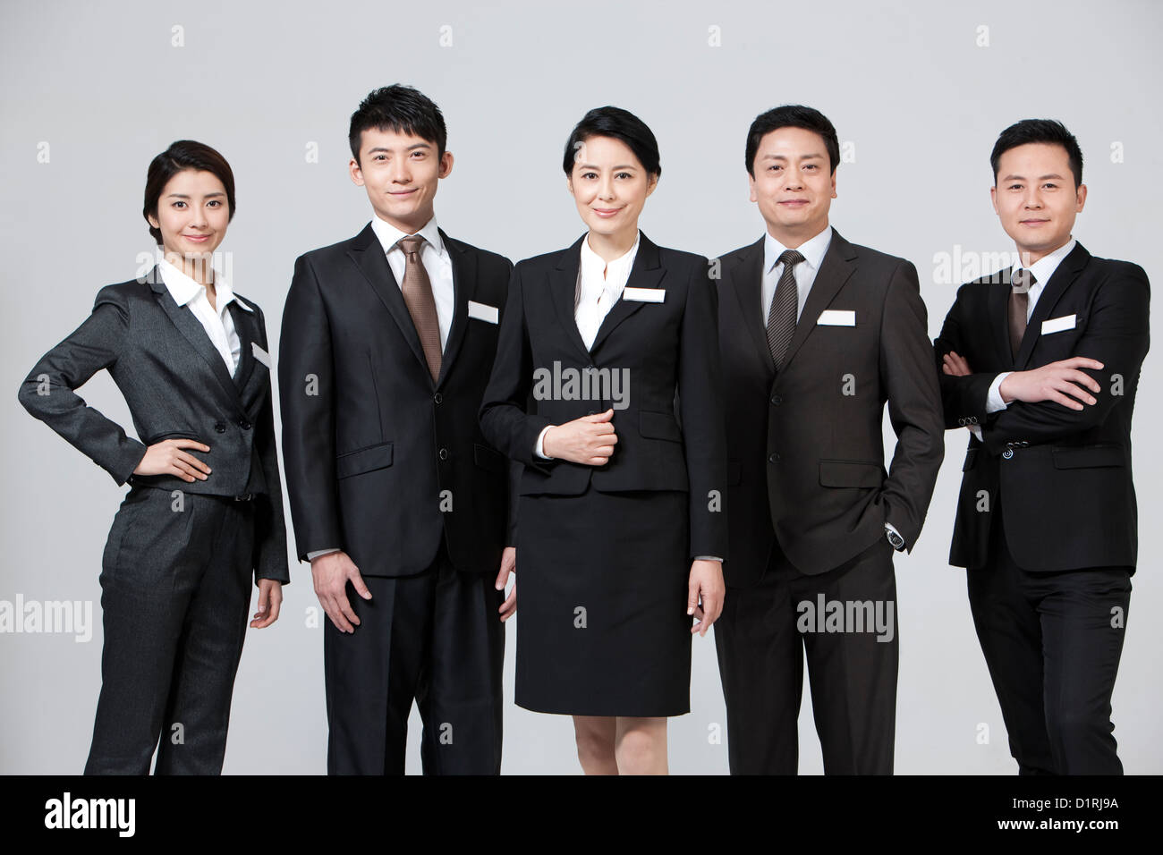 Portrait of professional and confident business team Stock Photo - Alamy