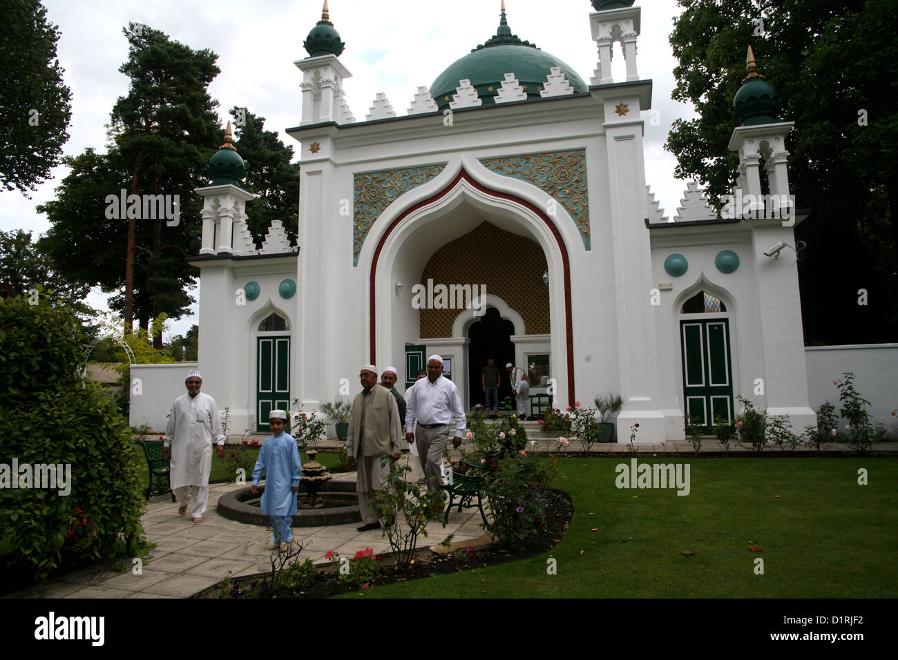 Muslim worshippers leave the Shah Jehan mosque in Woking, Surrey. Built ...