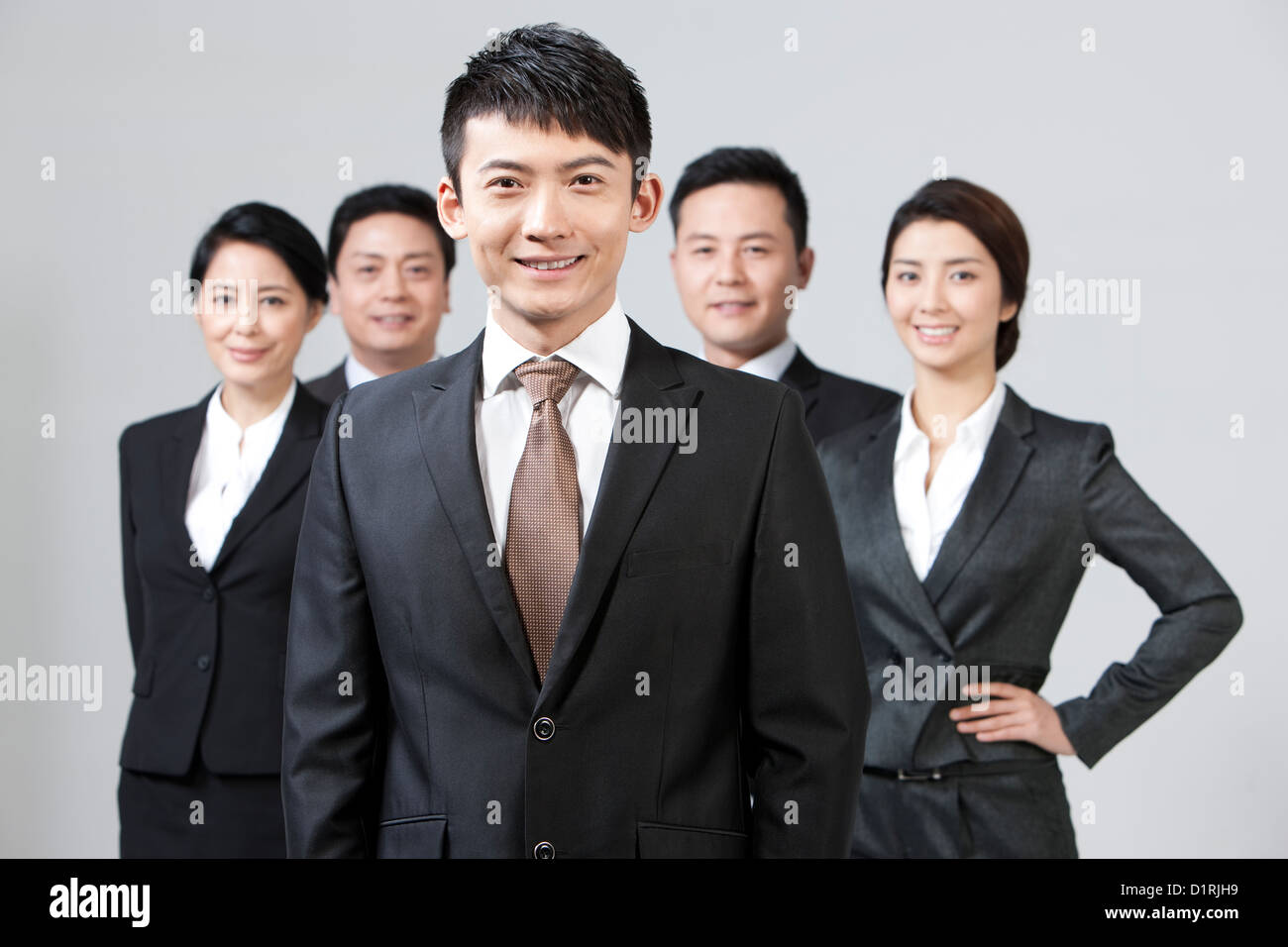 Portrait of professional and confident business team Stock Photo - Alamy