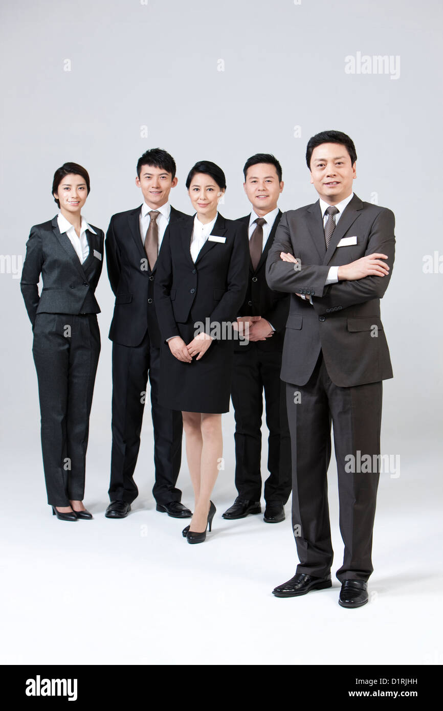 Portrait of professional and confident business team Stock Photo - Alamy
