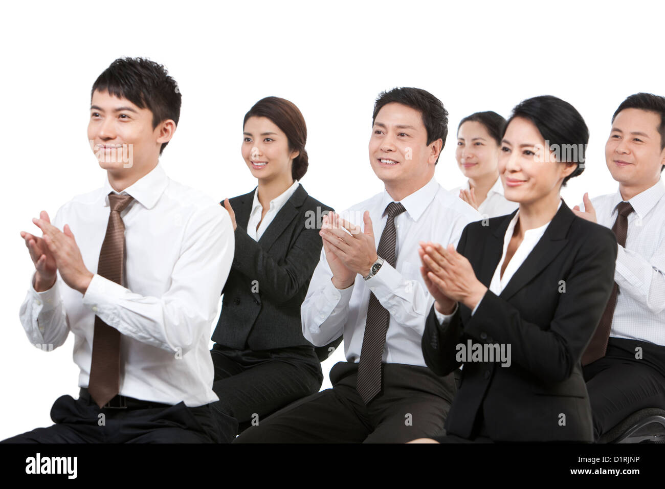 Cheerful business persons clapping in a meeting Stock Photo - Alamy