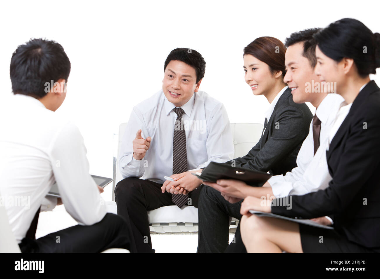Professional business persons in discussion Stock Photo - Alamy
