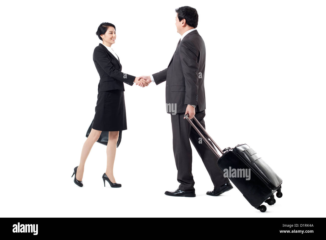 Cheerful business partner shaking hands Stock Photo - Alamy