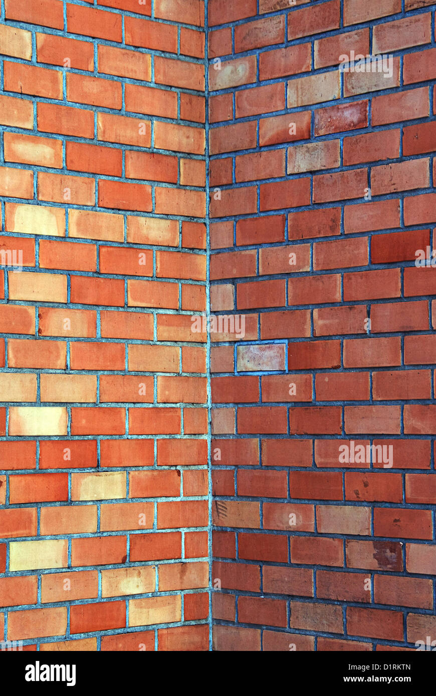 two bricks walls converging in a corner Stock Photo - Alamy