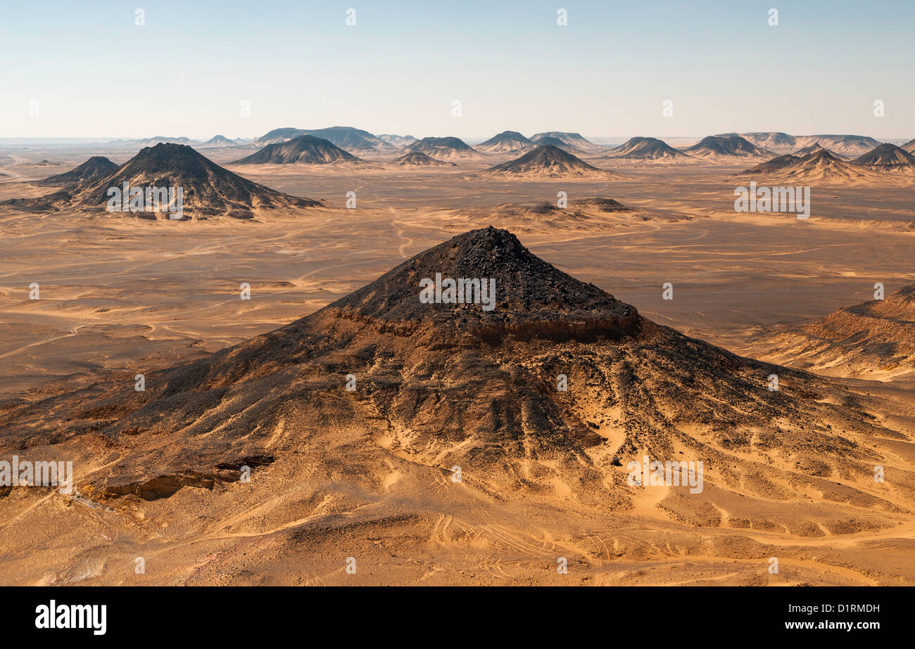 Volcano-shaped Pyramid Mountains of Black Desert, Egypt Stock Photo - Alamy