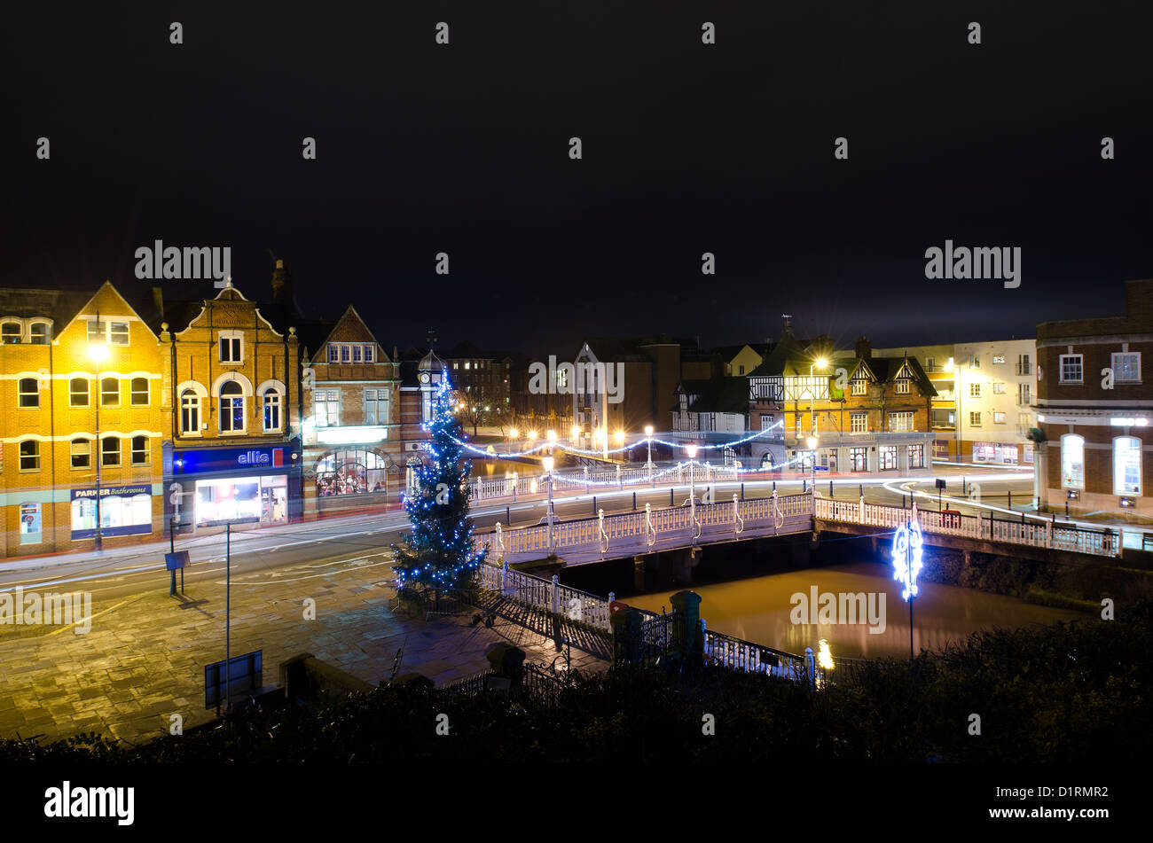 River Medway at Tonbridge with festive seasonal decorations lights and ...