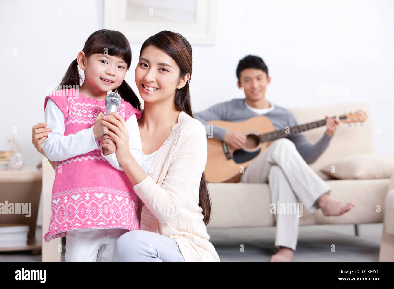 Art culture and entertainment holding microphone musical instrument ...