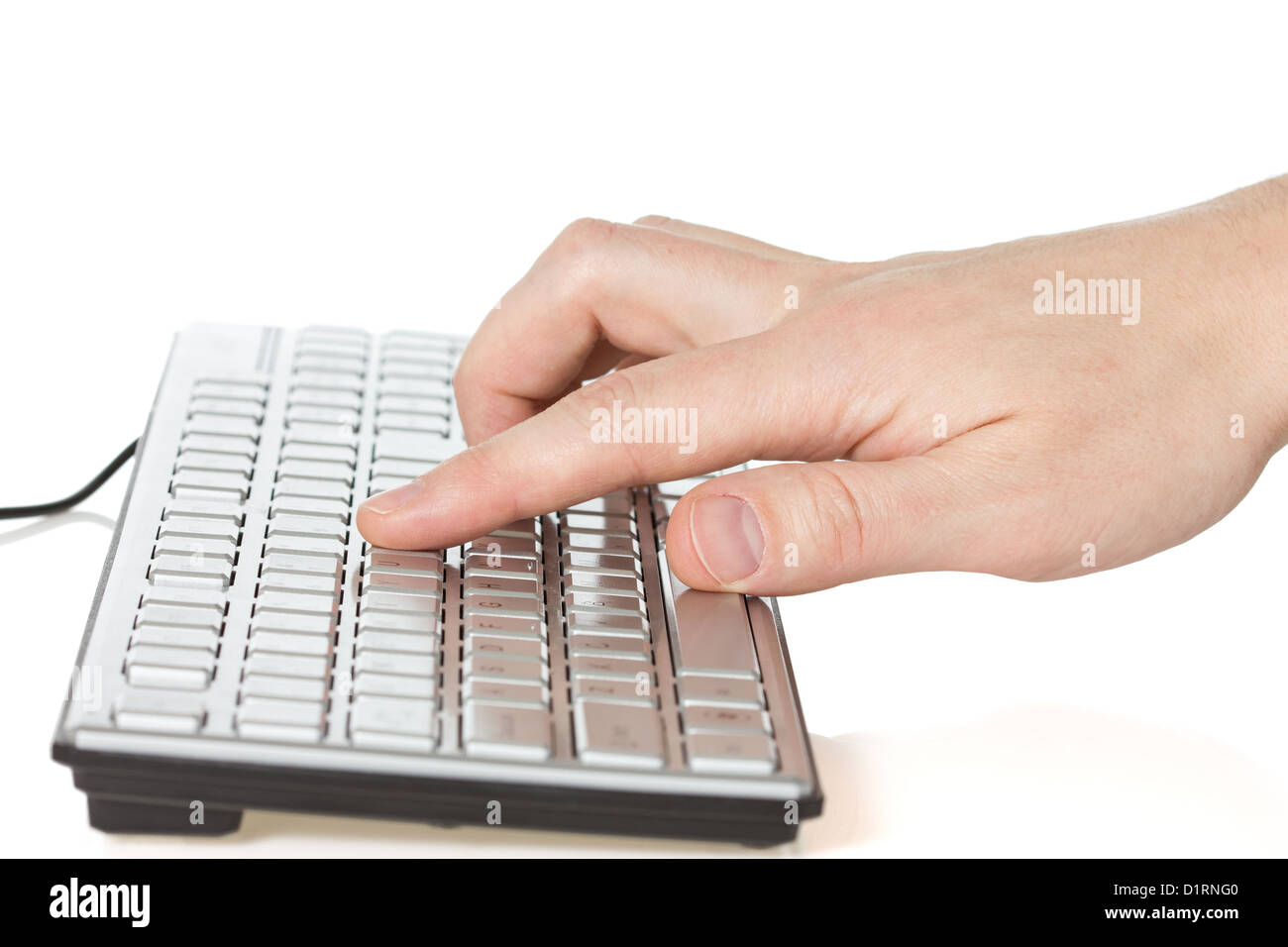 Hand typing on computer keyboard over a white background Stock Photo ...