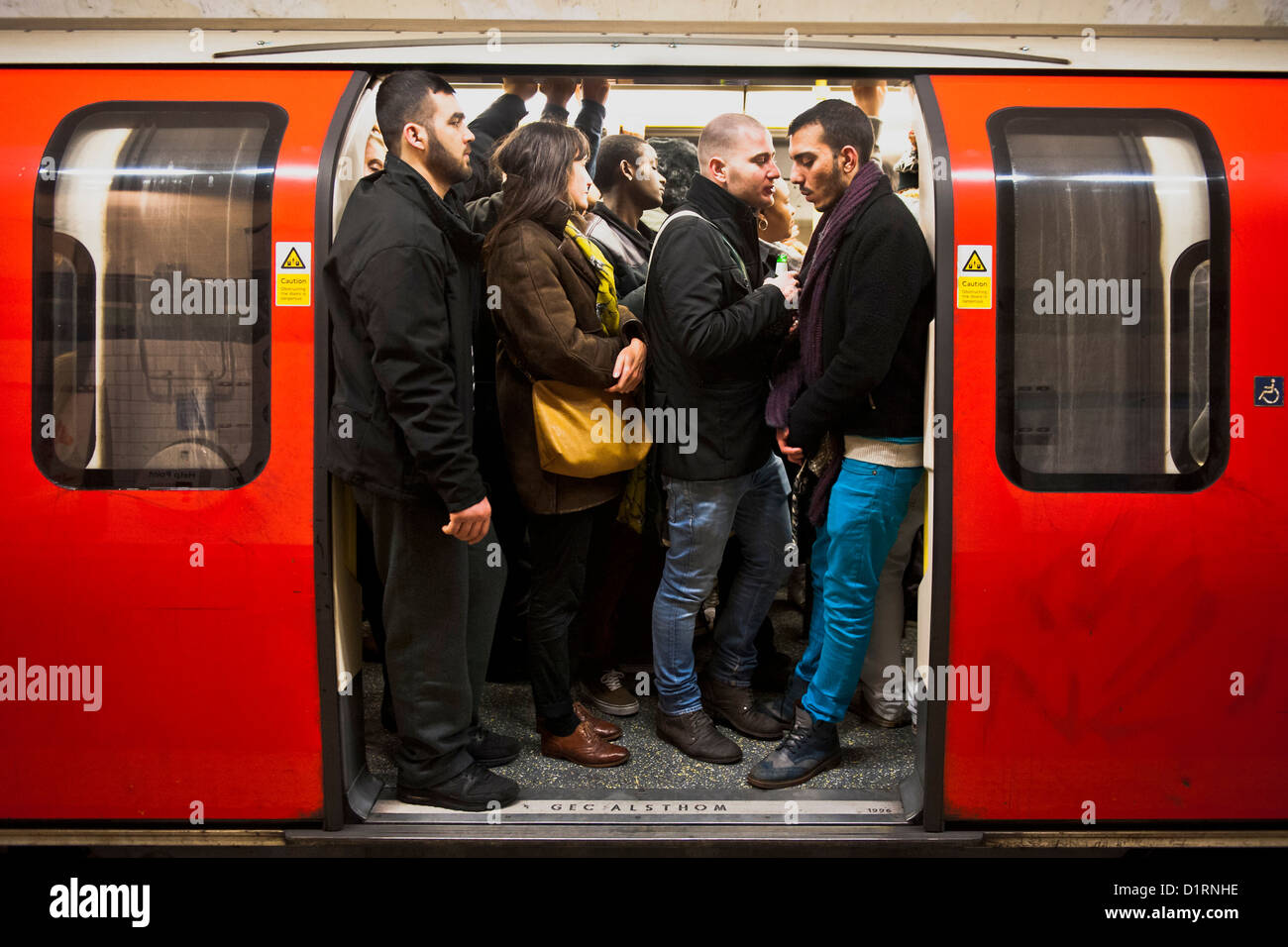 People stagger home on crowded tube trains taking advantage of the free ...
