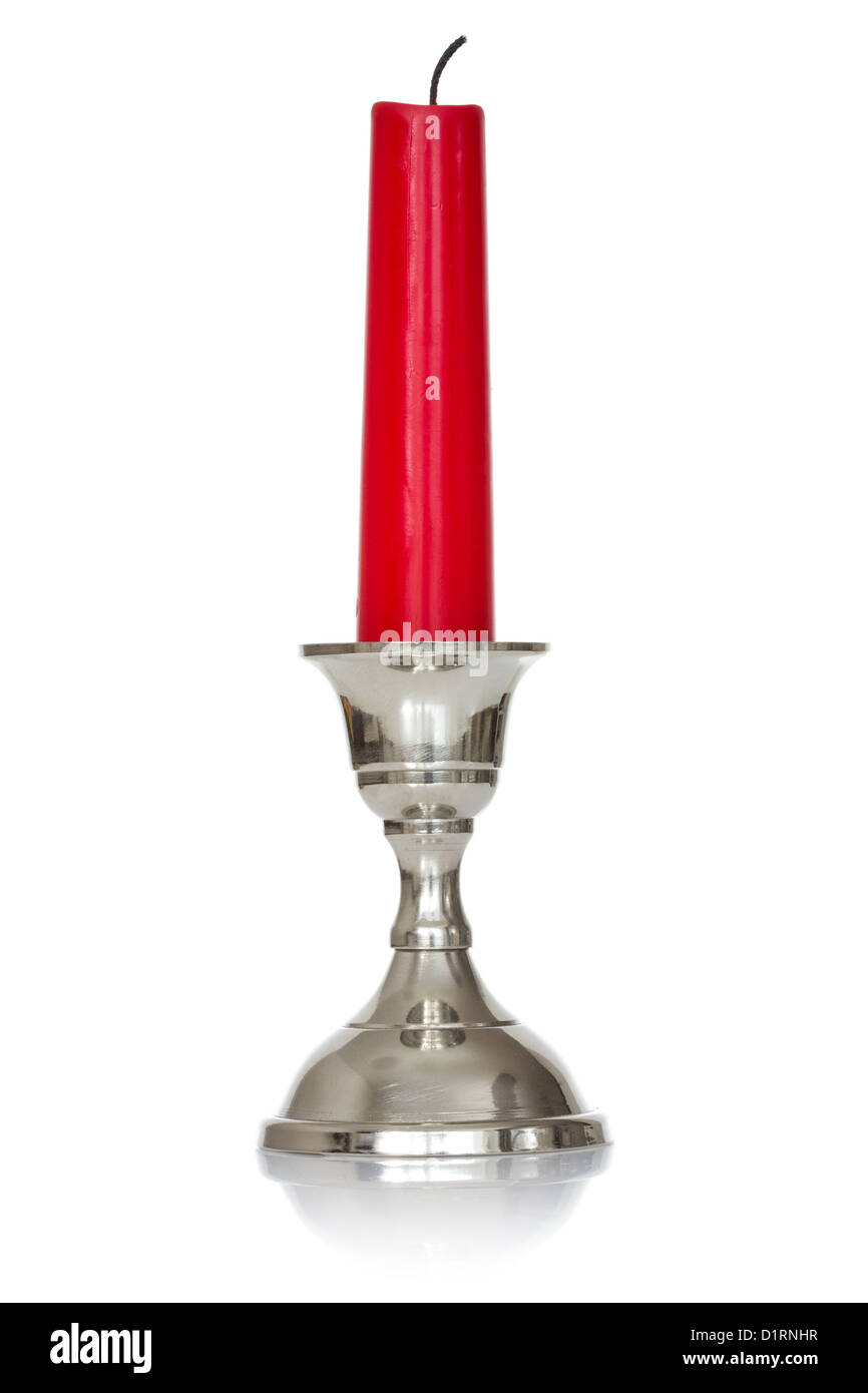 silver plated candlestick with red candle on white background Stock ...