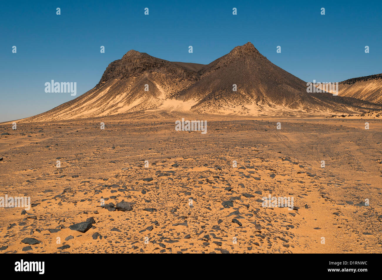 Volcano-shaped Mountains of Black Desert, Egypt Stock Photo - Alamy