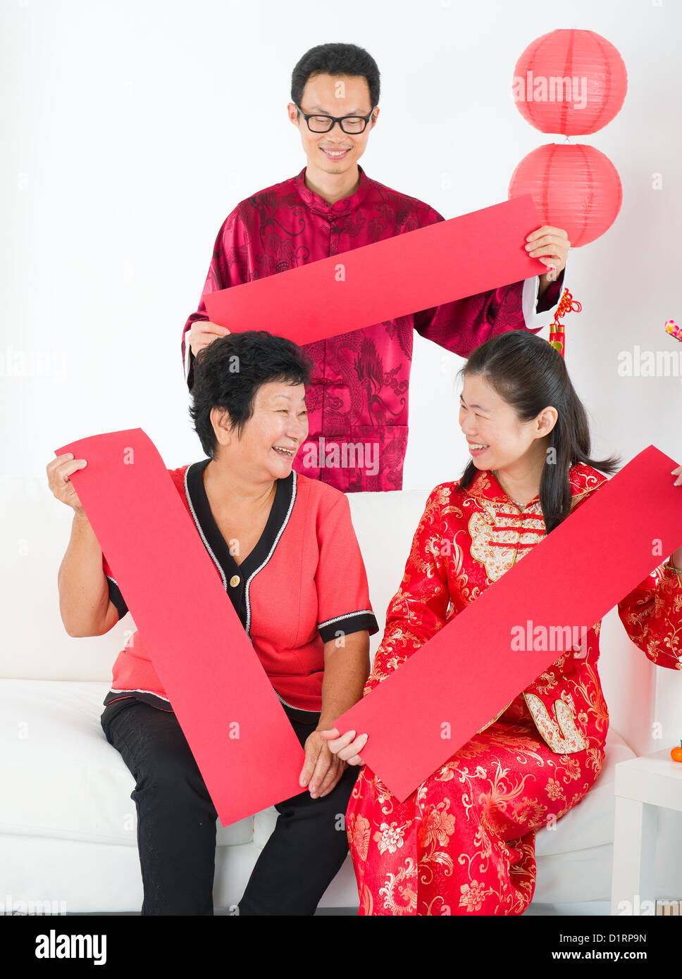 chinese new year family with good luck wishes Stock Photo - Alamy